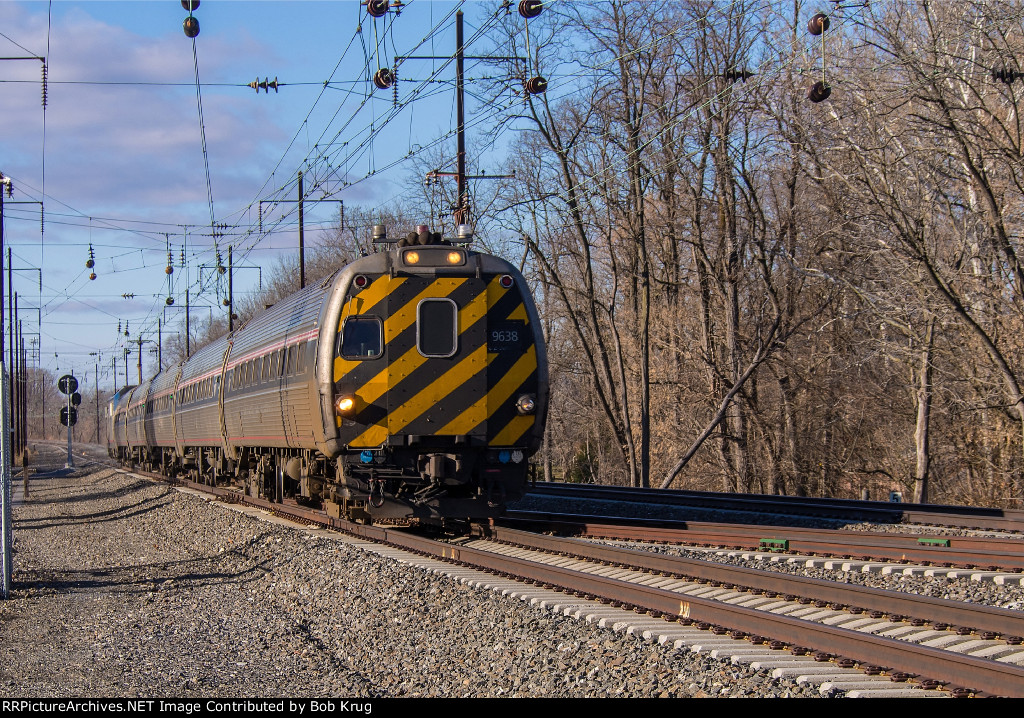 Cab car AMTK 9638 with eastbound Keystone Service through the interlocking at Leaman Place Junction